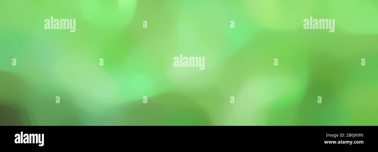 soft blurred landscape format background graphic with pastel green ...