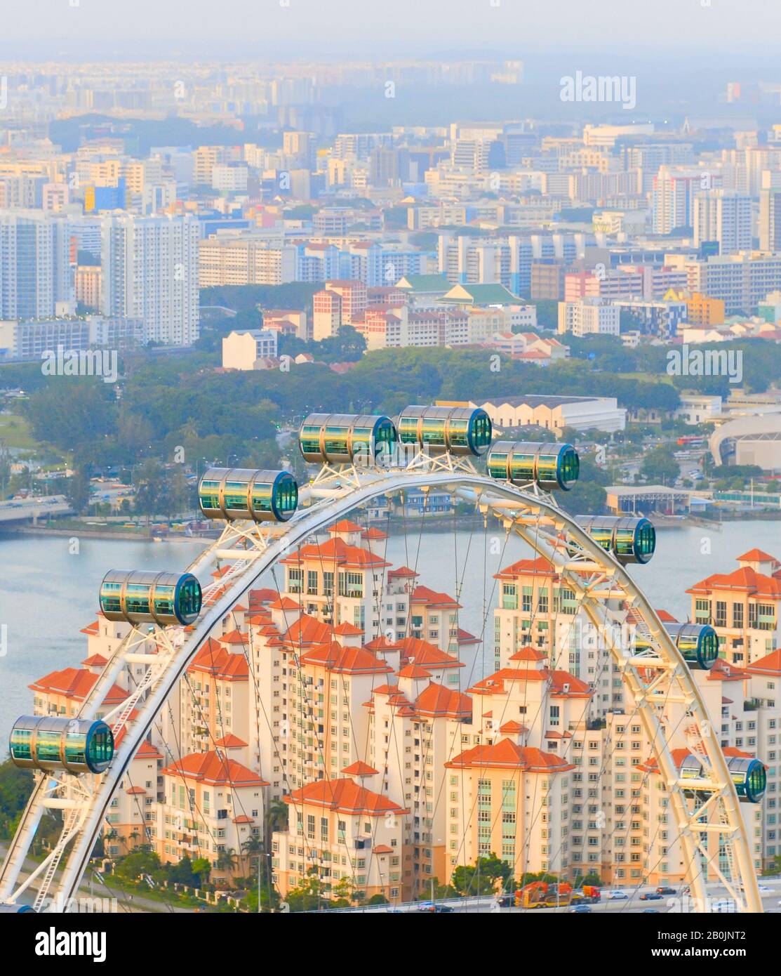 Skyline of Singapore with giant Ferries Wheel in the foreground Stock ...