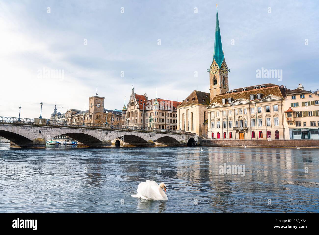 Zurich city landscape with a bridge over river and old buildings ...