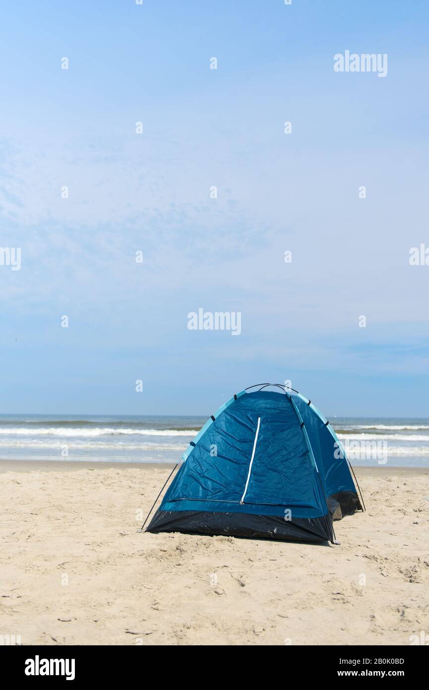 Single tent for camping in shelter at the beach Stock Photo - Alamy