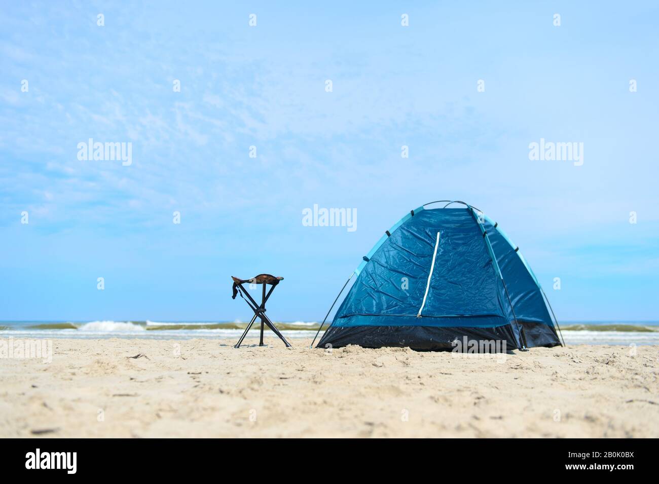 Single tent for camping in shelter at the beach Stock Photo - Alamy
