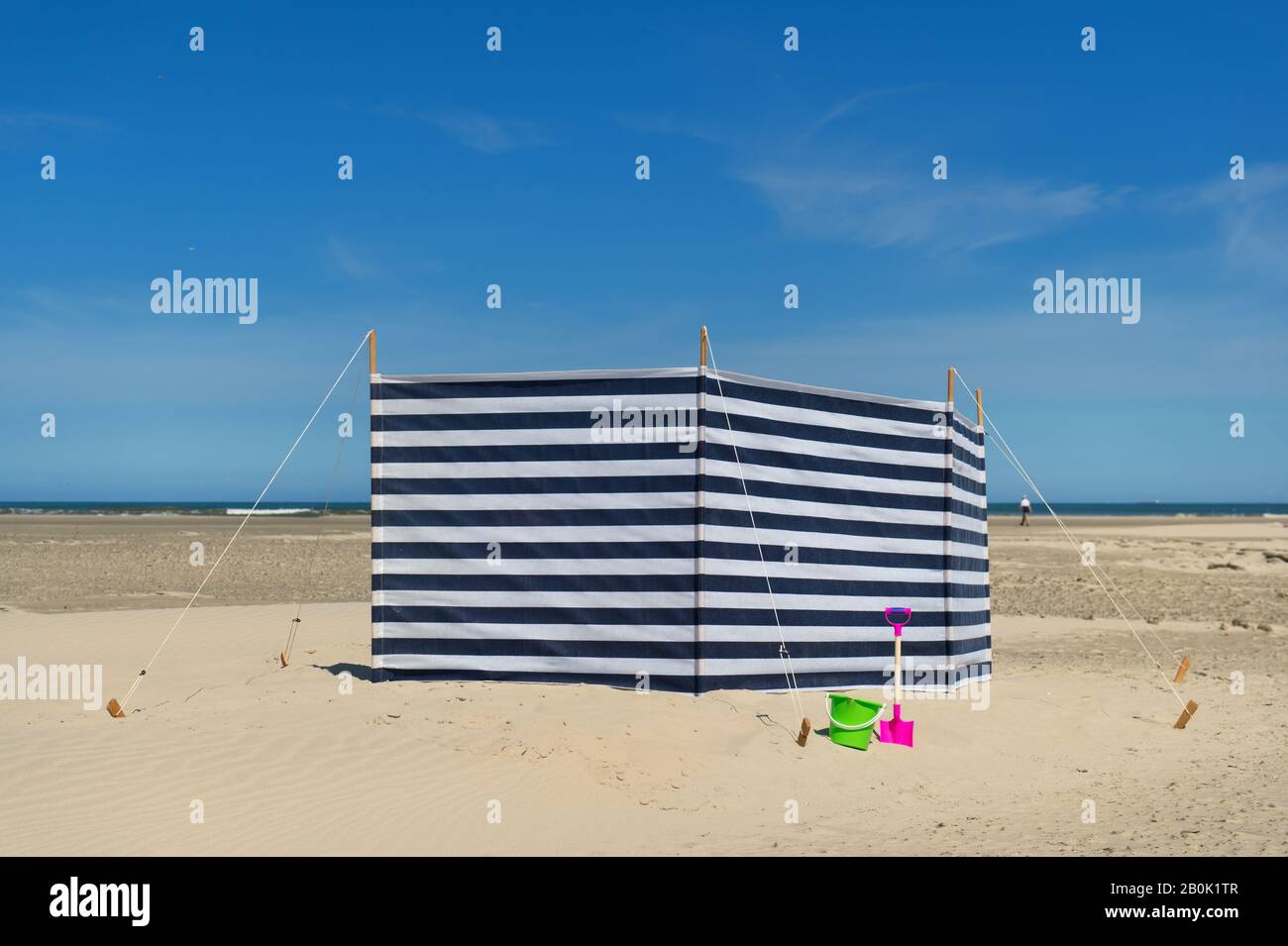 Striped wind break at the beach Stock Photo - Alamy