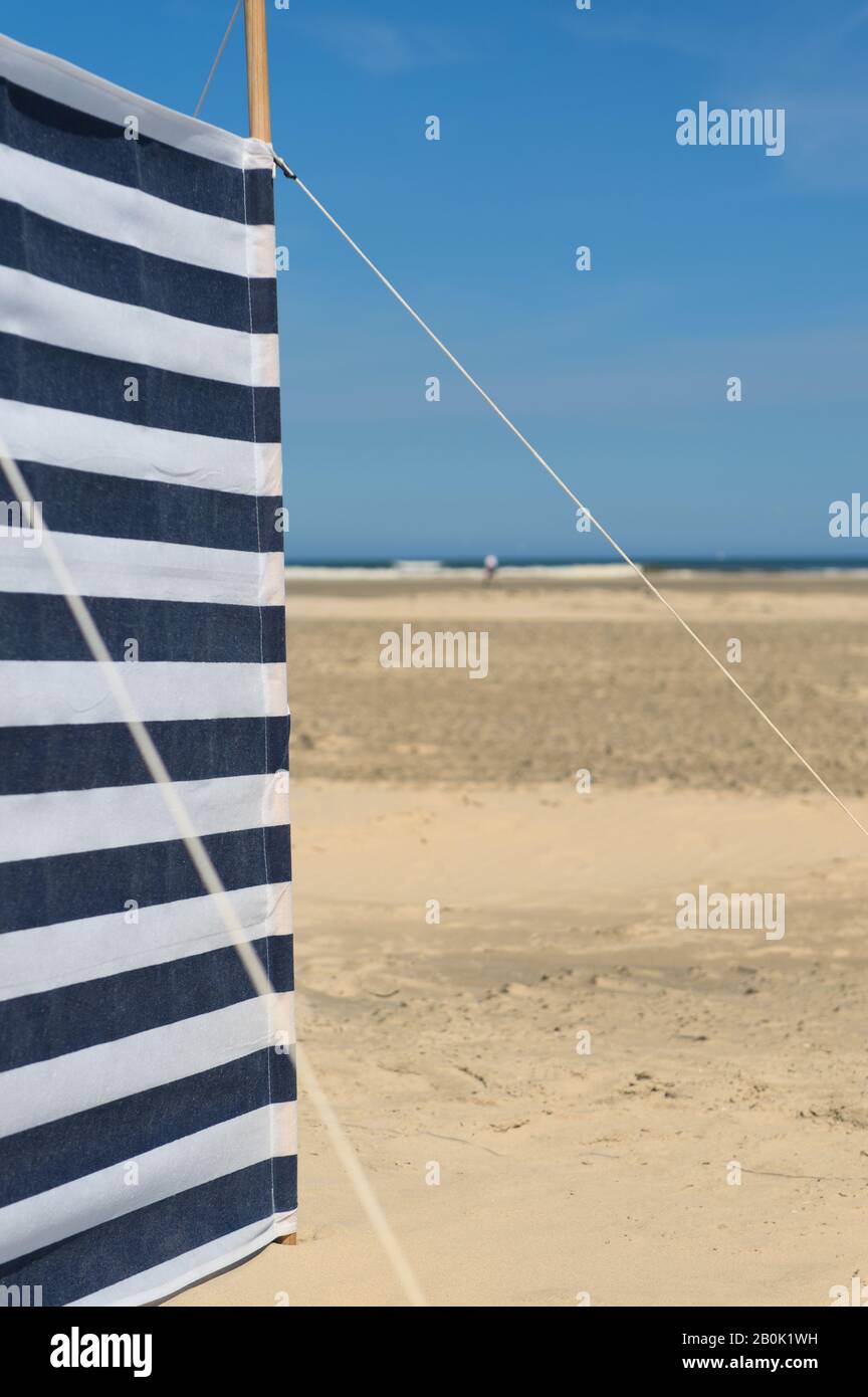 Striped wind break at the beach Stock Photo - Alamy