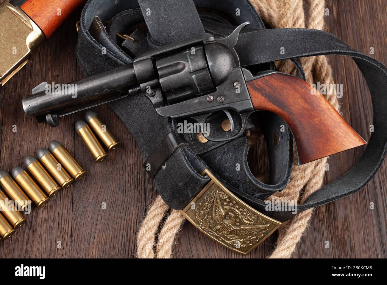Wild west weapons and ammunition on wooden table Stock Photo - Alamy