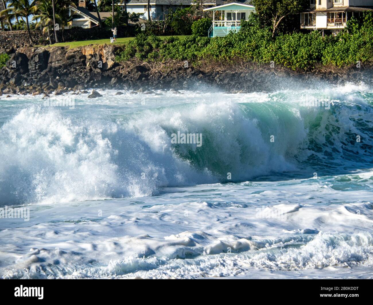 : Big waves on the north shore of Oahu with aquamarine seas, white foam ...