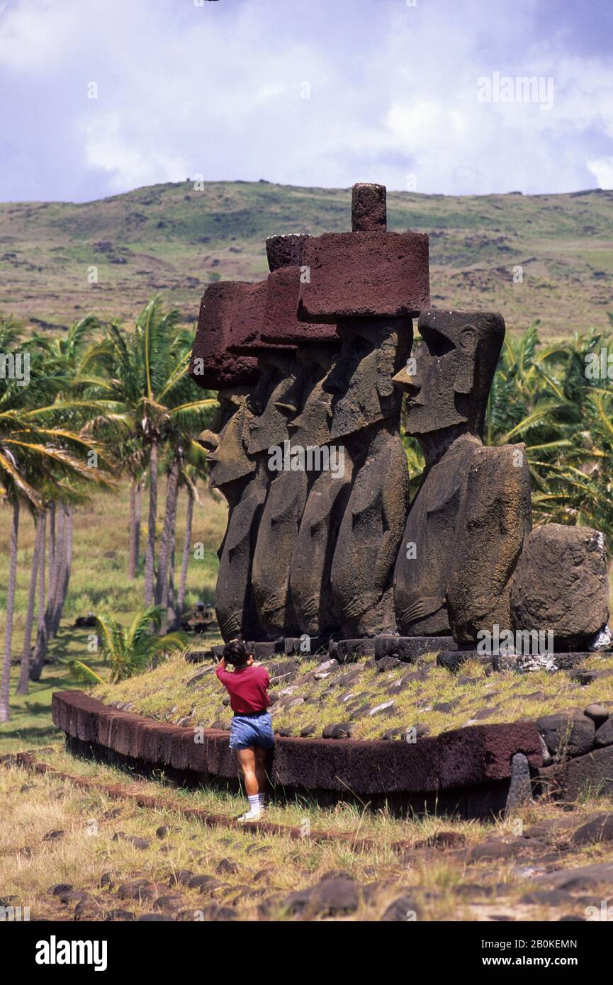 EASTER ISLAND, ANAKENA BEACH, MOAI STATUES WITH TOPKNOTS, TOURIST Stock ...