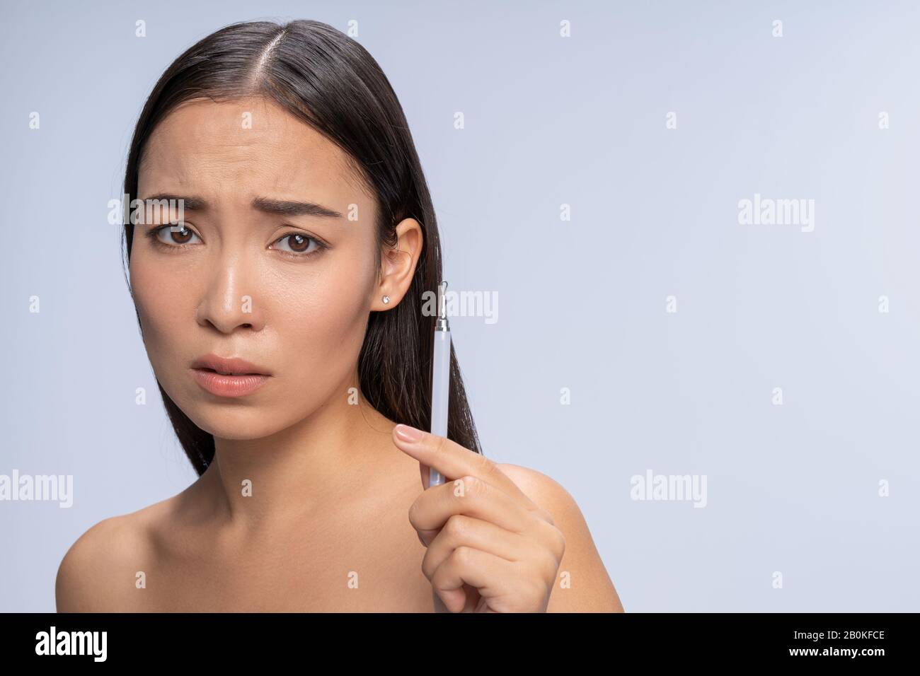 Close up of emotional girl that doing injection Stock Photo - Alamy