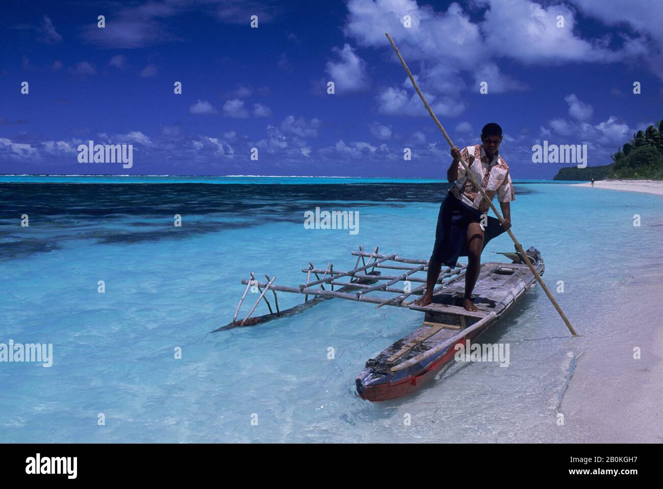 FIJI, LAU GROUP, FULANGA ISLAND, BEACH, MAN IN OUTRIGGER CANOE Stock ...