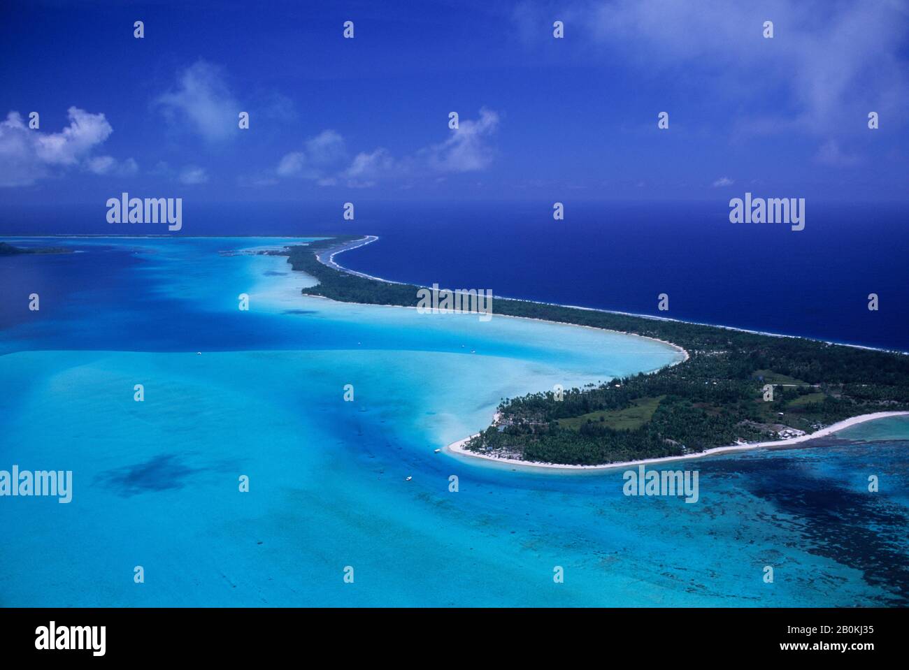 FRENCH POLYNESIA, SOCIETY ISLANDS, BORA BORA, AERIAL VIEW OF LAGOON AND ...
