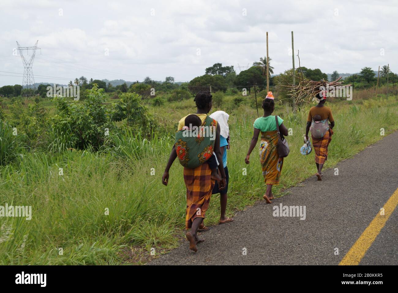 African woman on their way back home Stock Photo - Alamy