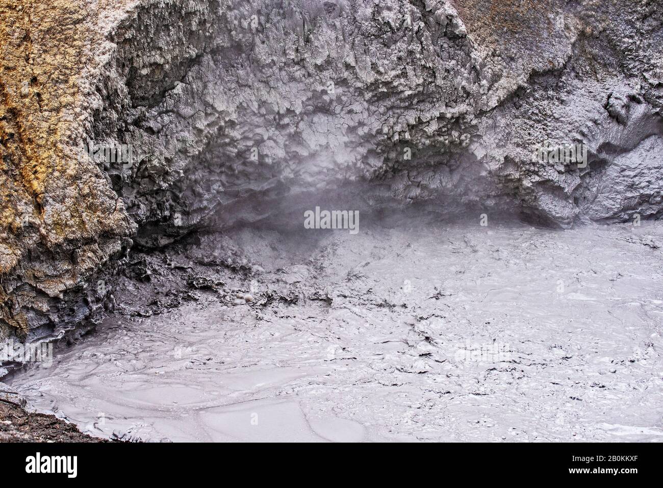 Mud pot spewing off hot gases and steam Stock Photo - Alamy