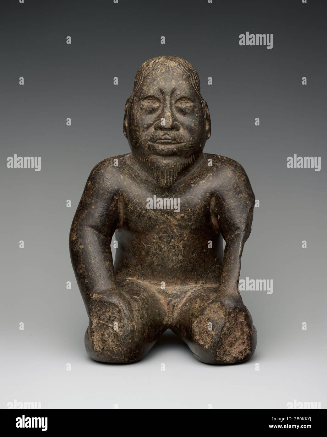 Kneeling bearded figure hi-res stock photography and images - Alamy