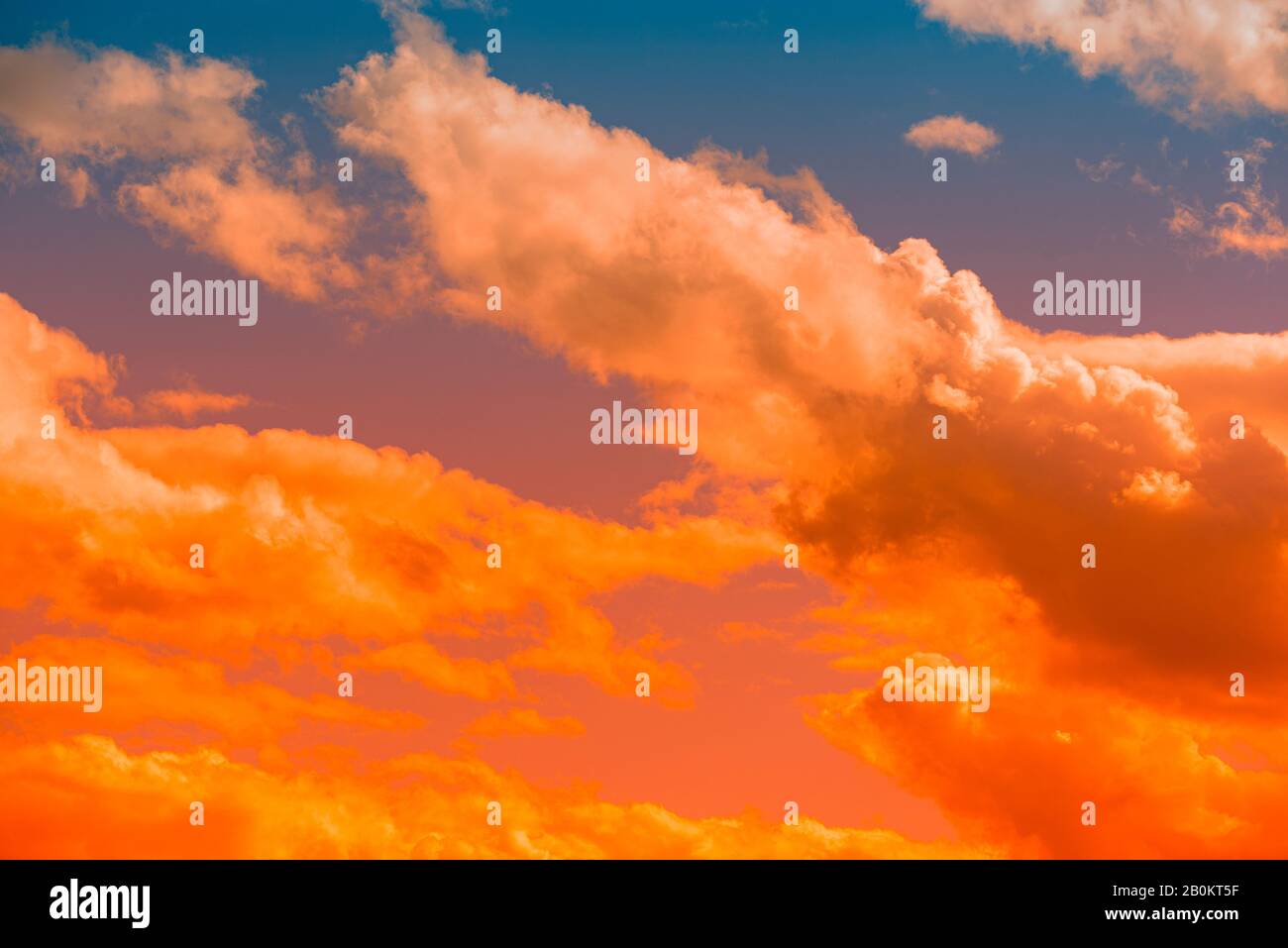 Colorful clouds fill the skies at dawn Stock Photo - Alamy