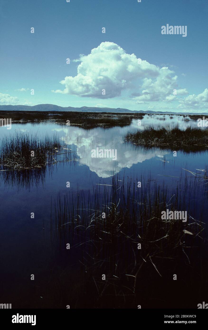 PERU, LAKE TITICACA, CUMULUS CLOUDS Stock Photo - Alamy