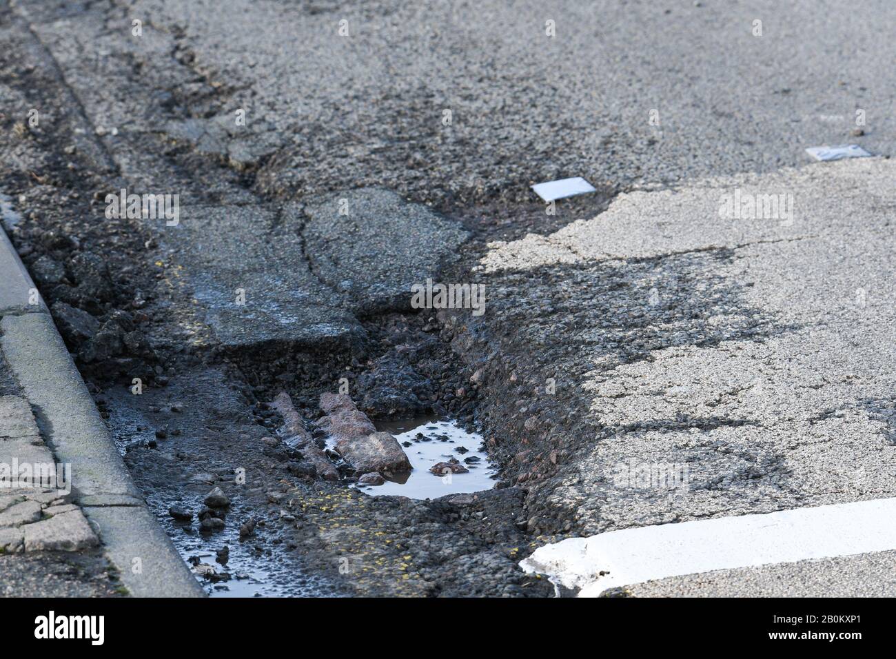 Asphalt road potholes hi-res stock photography and images - Alamy