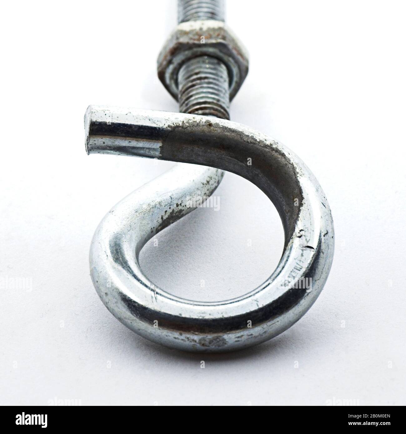 Steel pigtail screw hook on white background. Safety piece of hardware ...