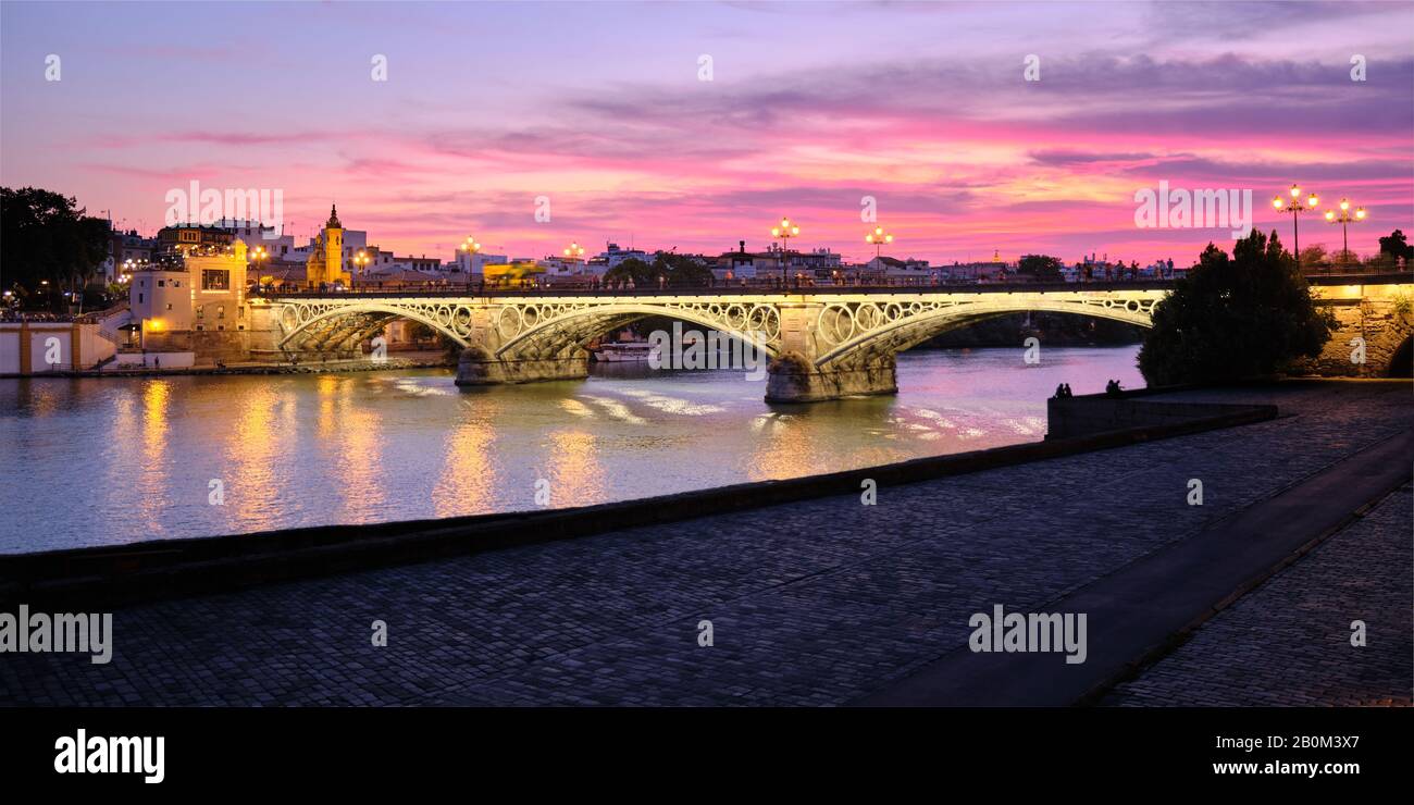 View Of Triana Bridge In Seville Spain At Sunset Stock Photo - Alamy