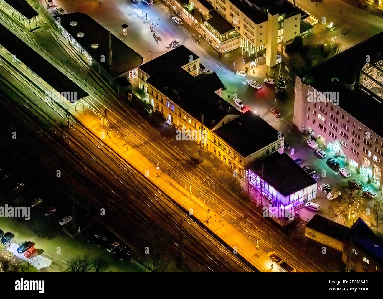 aerial photo flight over the nocturnal Unna, Unna central station, Unna ...