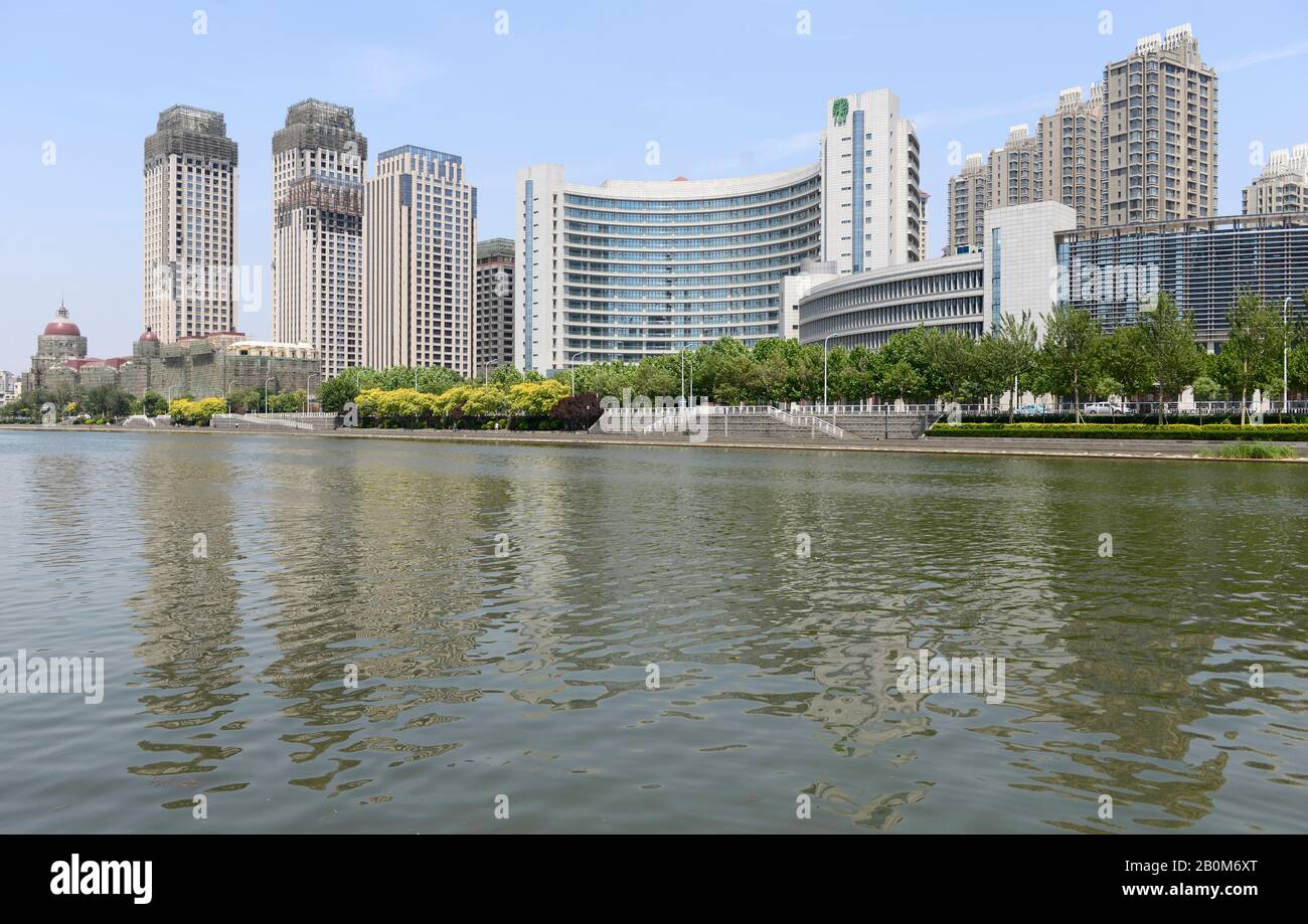View of buildings on Haihe East road by the Haihe river in Tianjin ...