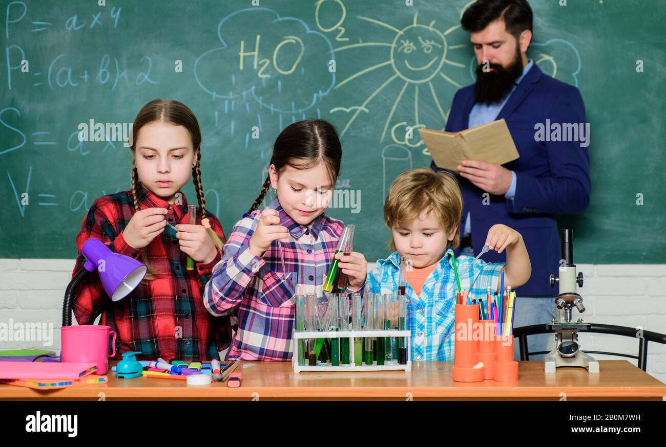 chemistry lab. back to school. happy children teacher. kids in lab coat ...
