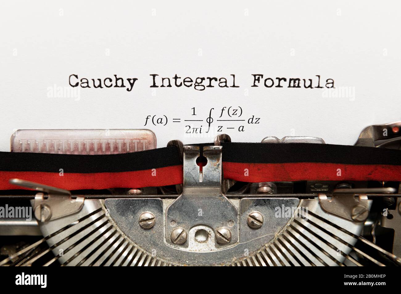 Front view of Cauchy math integral formula printed on paper with ...