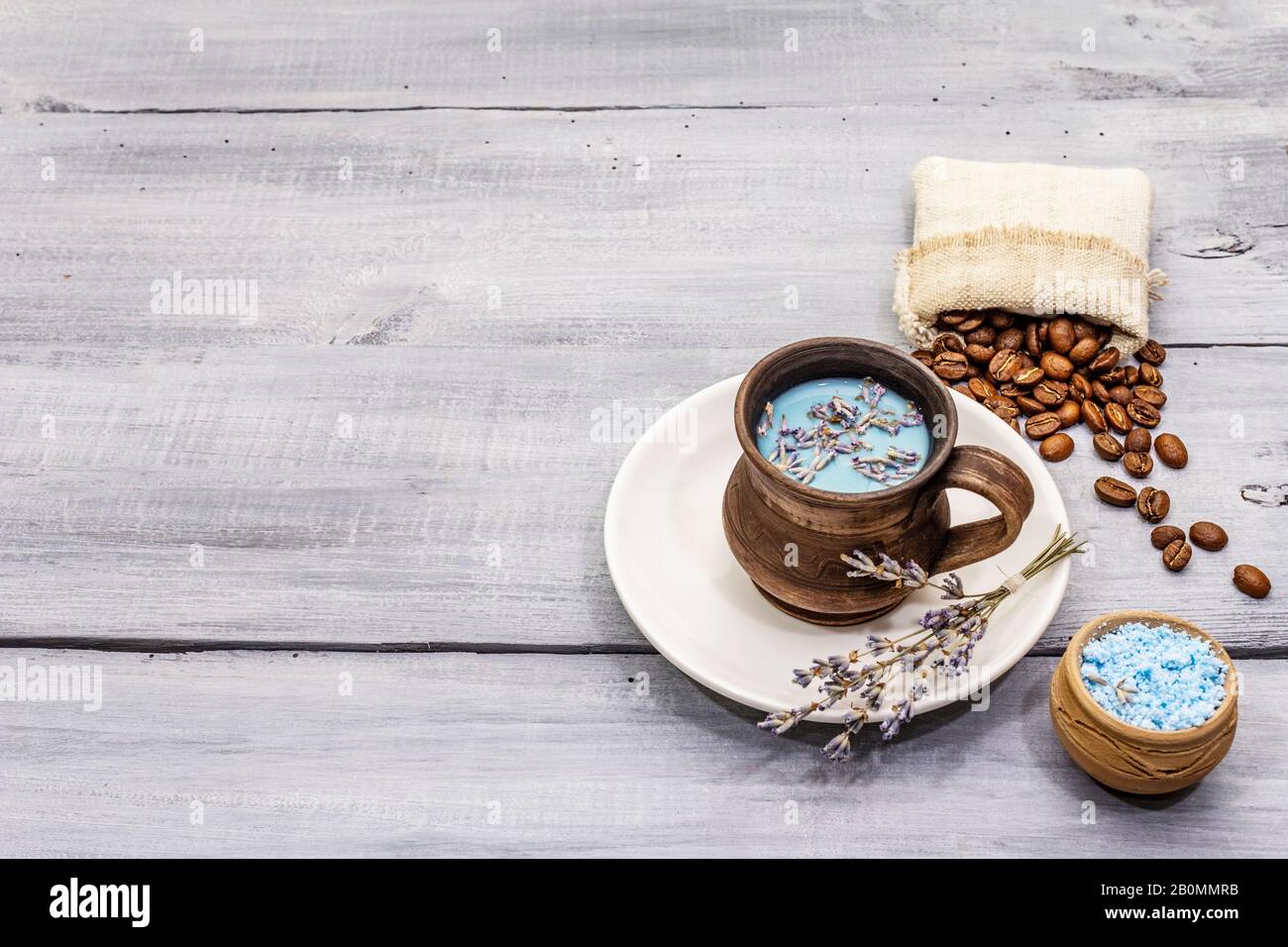 Trendy colored latte. Lavender and powdered aromatic sugar, coffee ...
