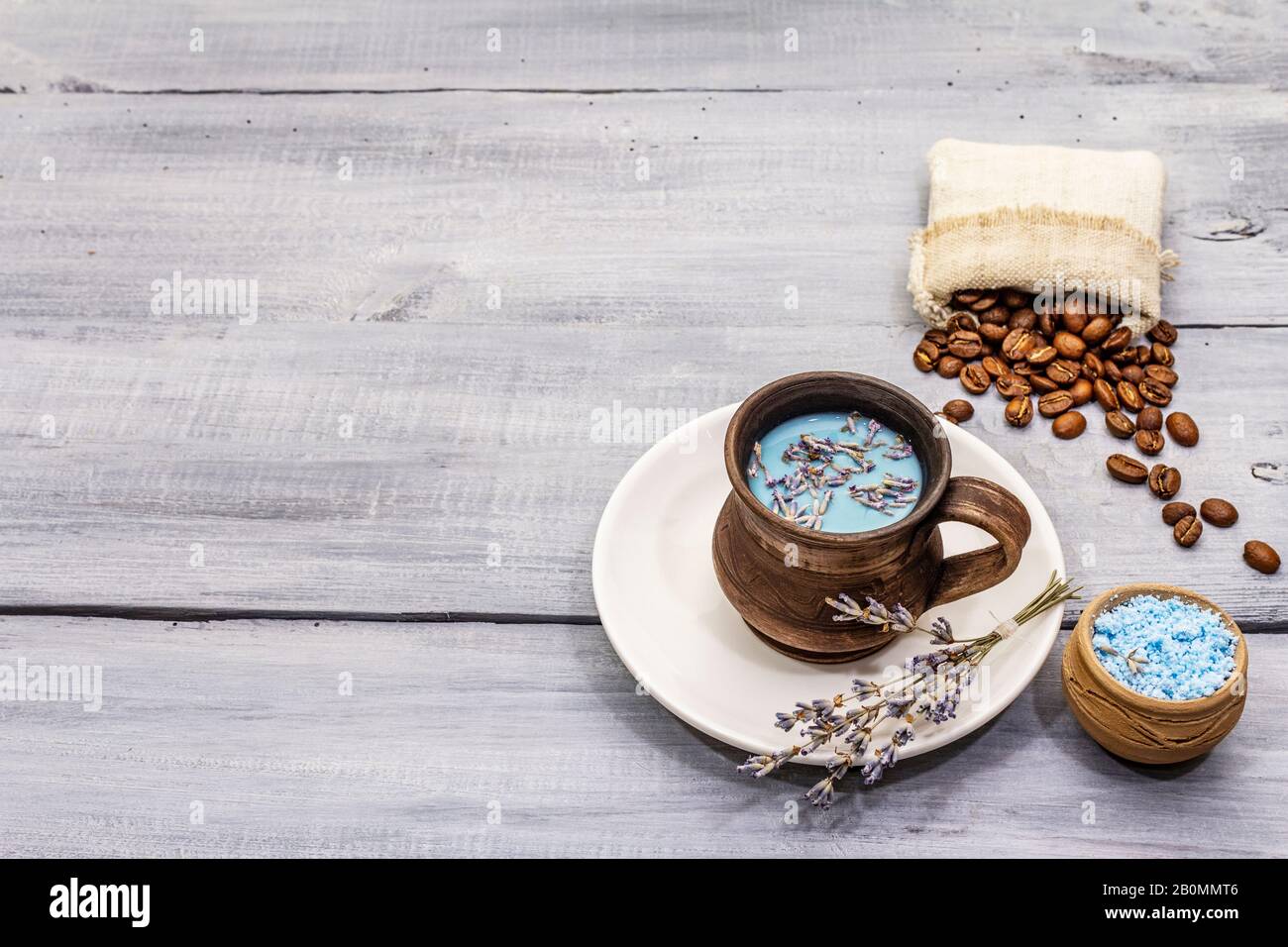 Trendy colored latte. Lavender and powdered aromatic sugar, coffee ...