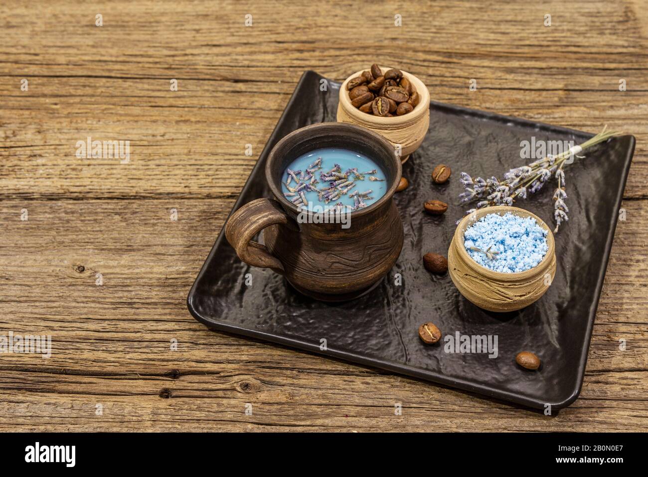 Trendy colored latte. Lavender and powdered aromatic sugar, coffee ...