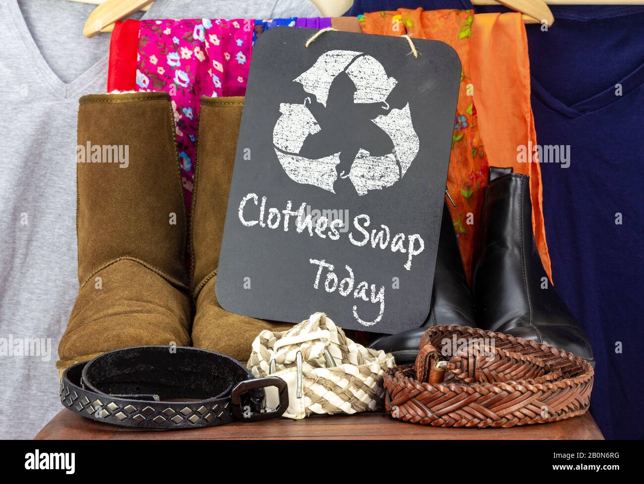 Clothes Swap and recycle clothes icon on chalk board with fashion items ...