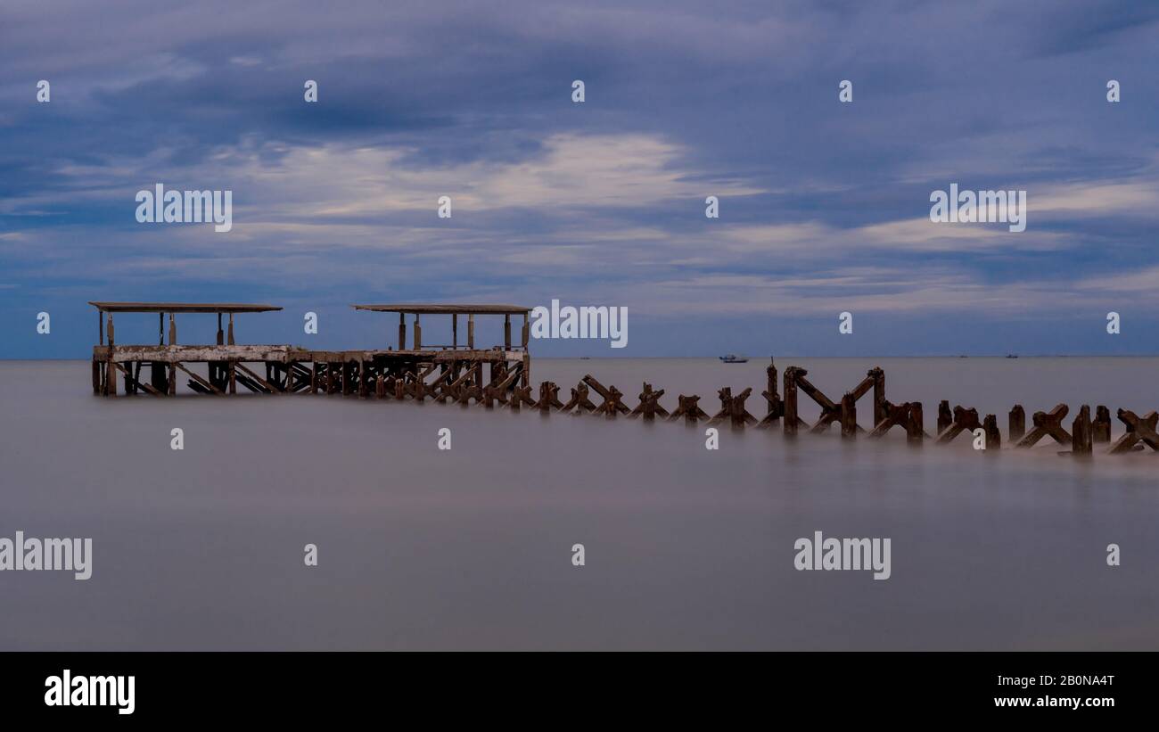Dilapidated old fishing dock collapsing into the sea in Pak Nam Pran on ...