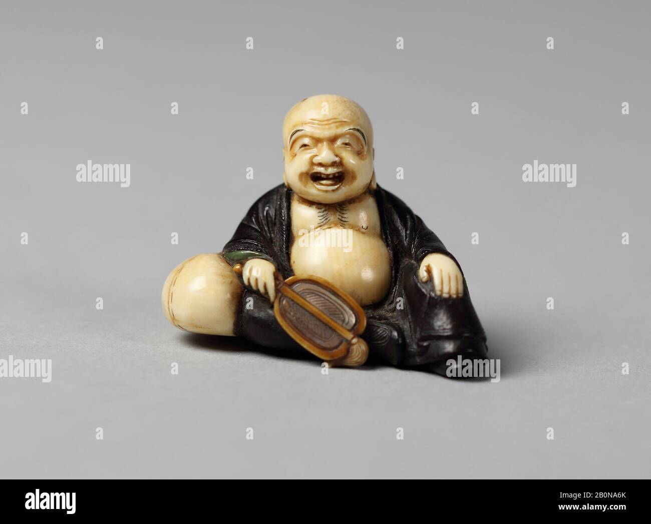 Netsuke of Hotei with a Fan, Japan, 19th century, Japan, Wood and ivory ...