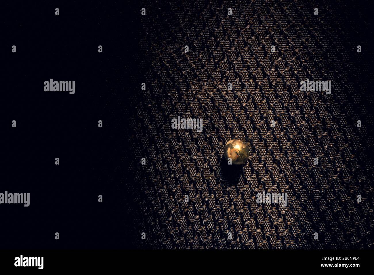 single pellet like bead on a black backgrounds Stock Photo - Alamy