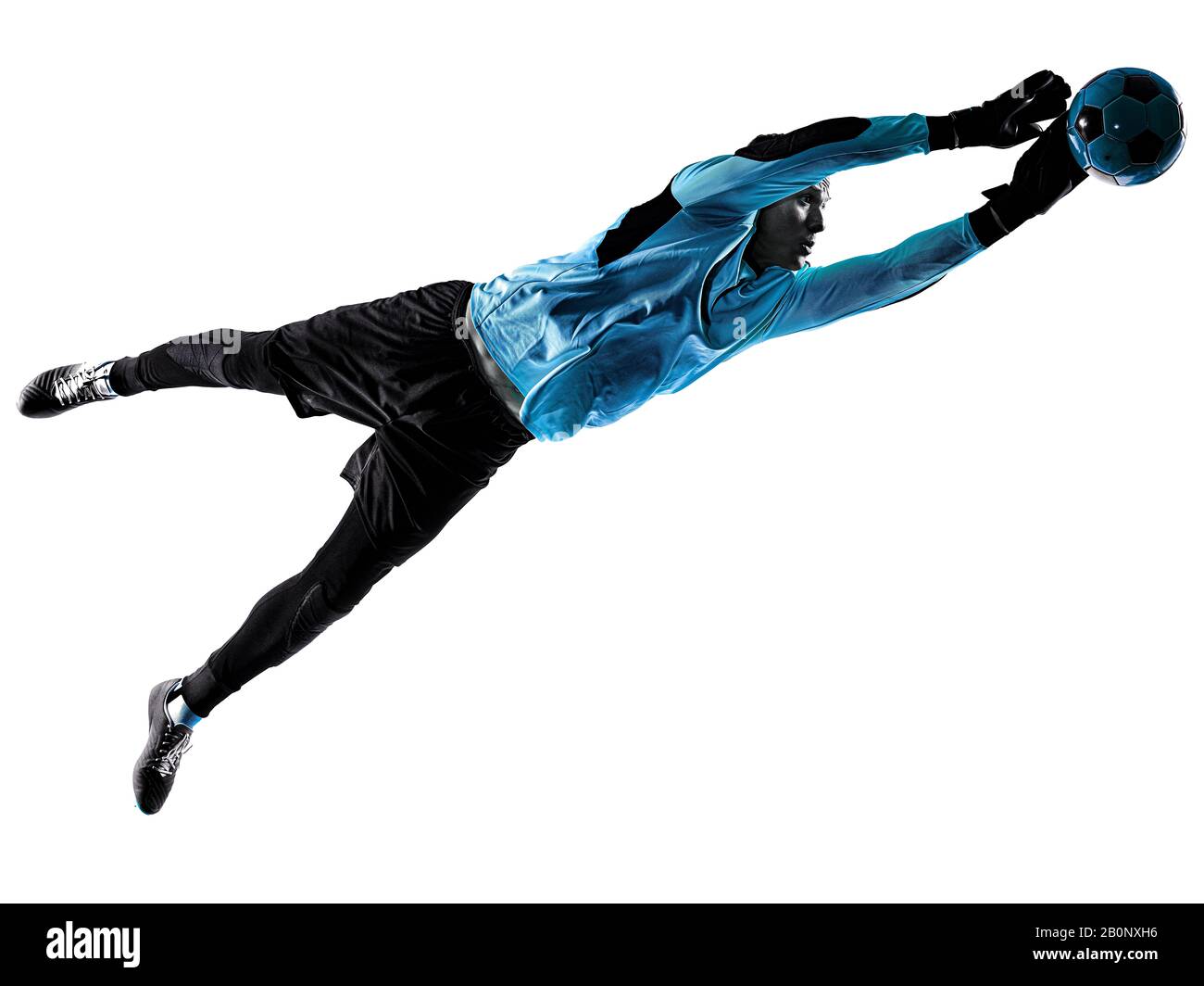 one caucasian soccer player goalkeeper man in studio silhouette shadow ...