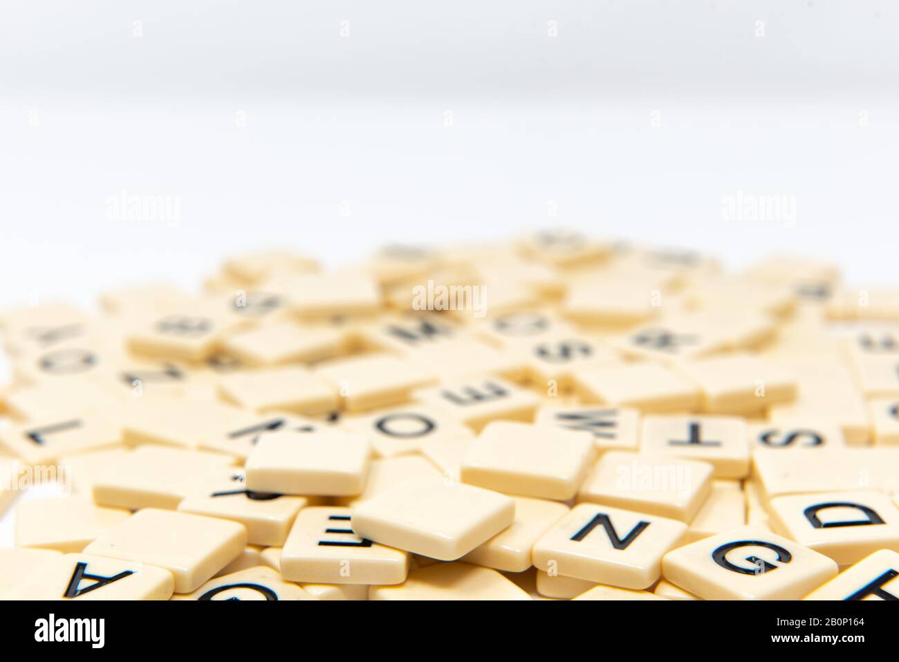 Close up of letter tiles on white background Stock Photo - Alamy