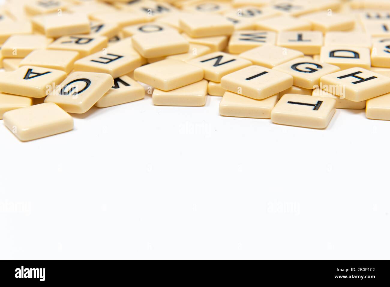 Close up of letter tiles on white background Stock Photo - Alamy