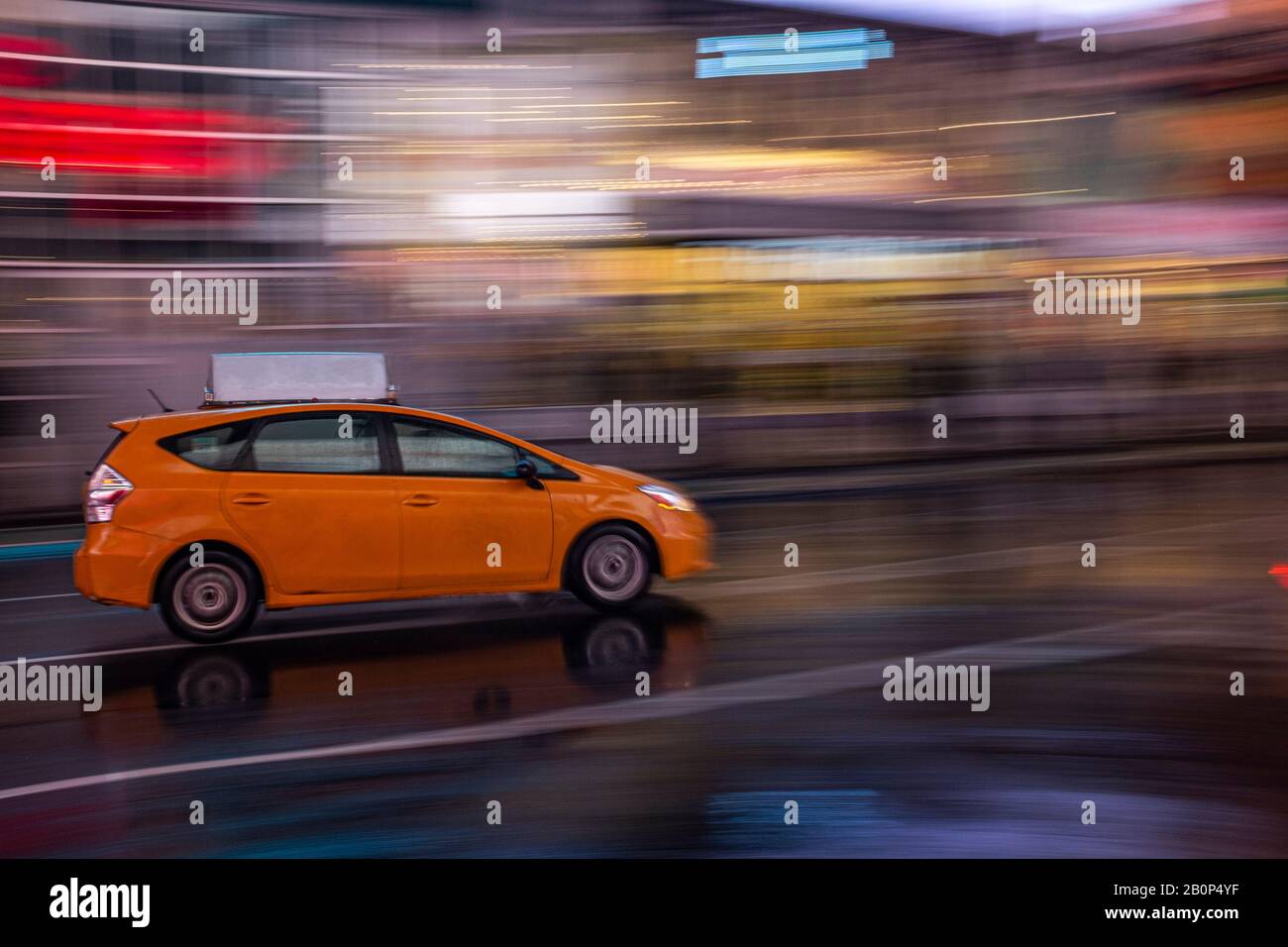 Yellow cab on the speed Stock Photo - Alamy