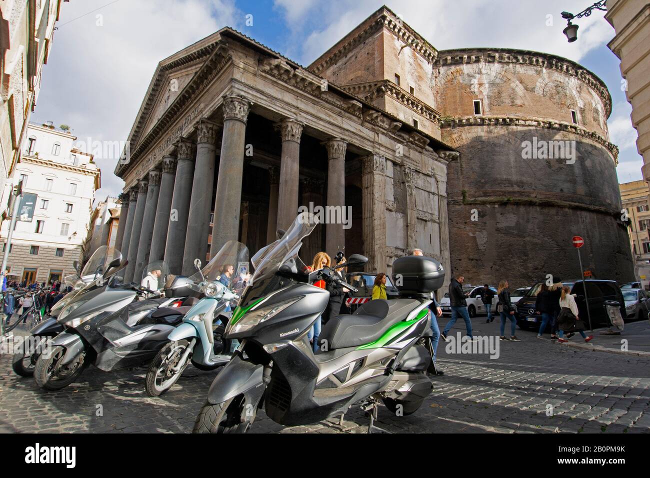 Motorcycles parked in front of the Pantheon, a well-preserved former ...