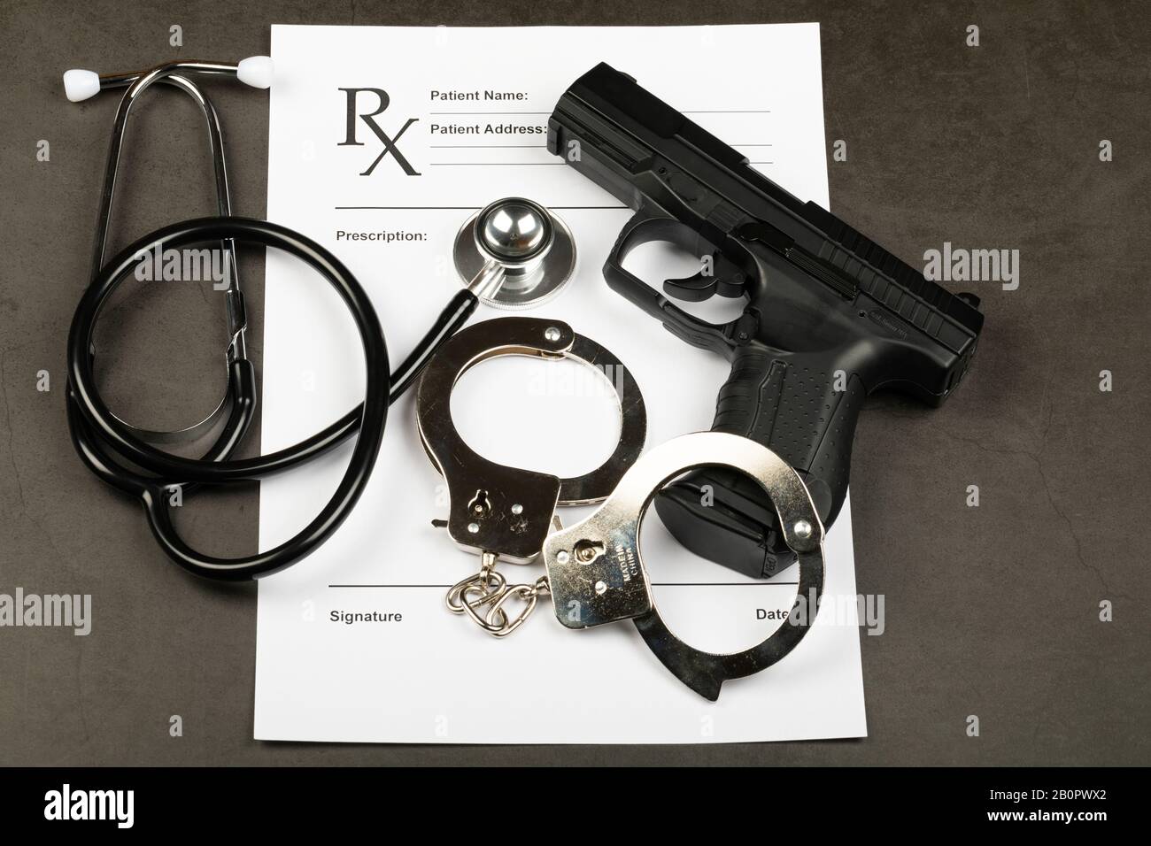 Picture of a medical prescription, handgun and handcuffs Stock Photo ...