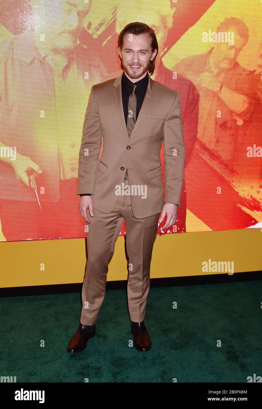 LOS ANGELES, CA - FEBRUARY 19: Greg Austin attends the premiere of ...