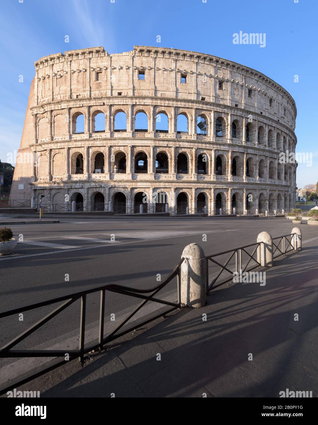 Silhouette of the Flavius Amphitheatre ruins (Coliseum) at sunrise, on ...
