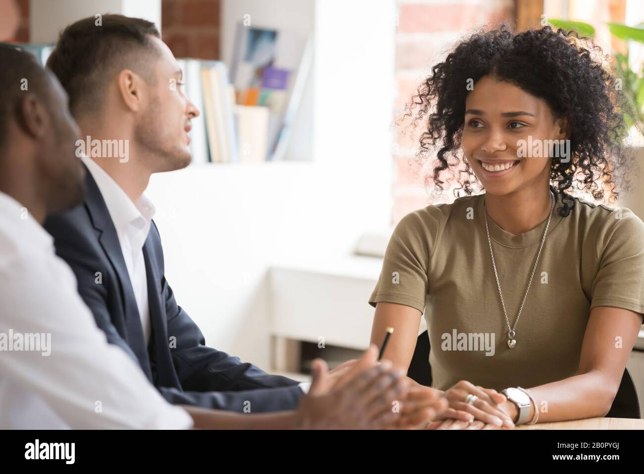 Black woman applicant answer hi-res stock photography and images - Alamy