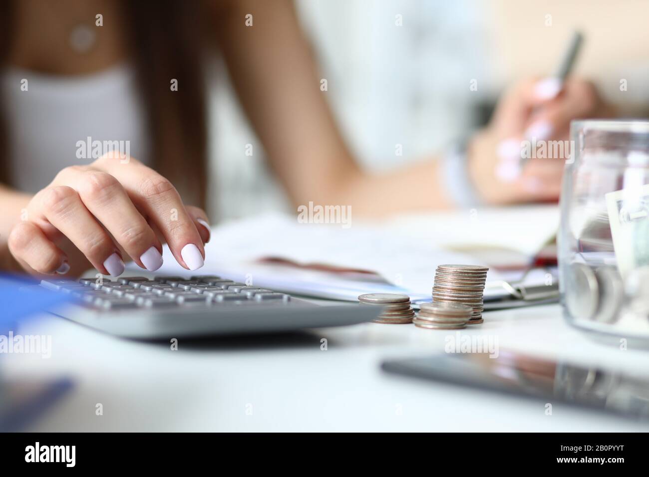 Worker making balance Stock Photo - Alamy