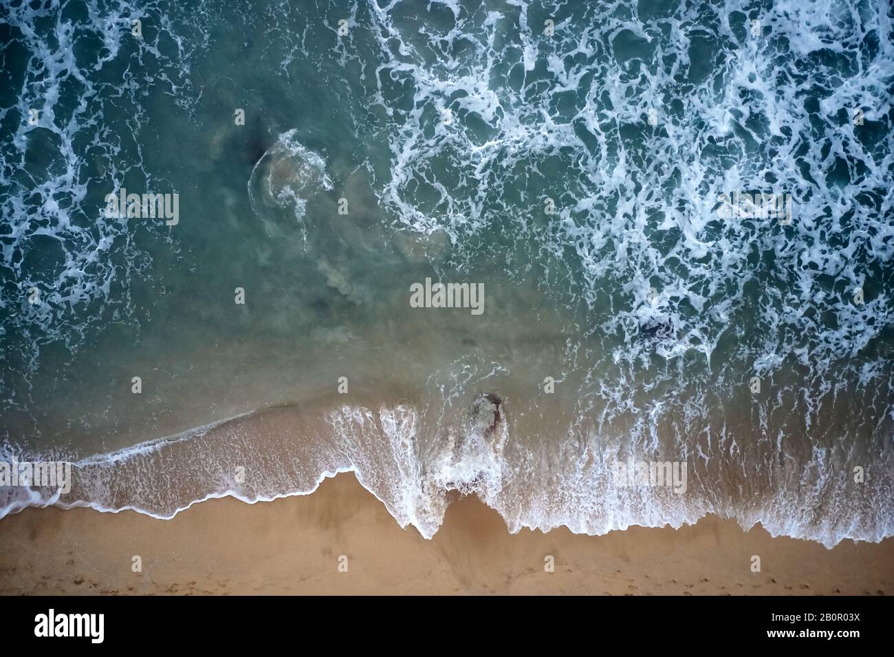 Aerial View of Waves and Azure beach with rocks. Kerala, India Stock ...