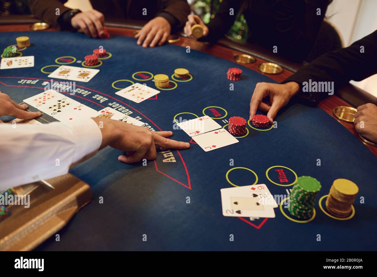 Poker hands hi-res stock photography and images - Alamy