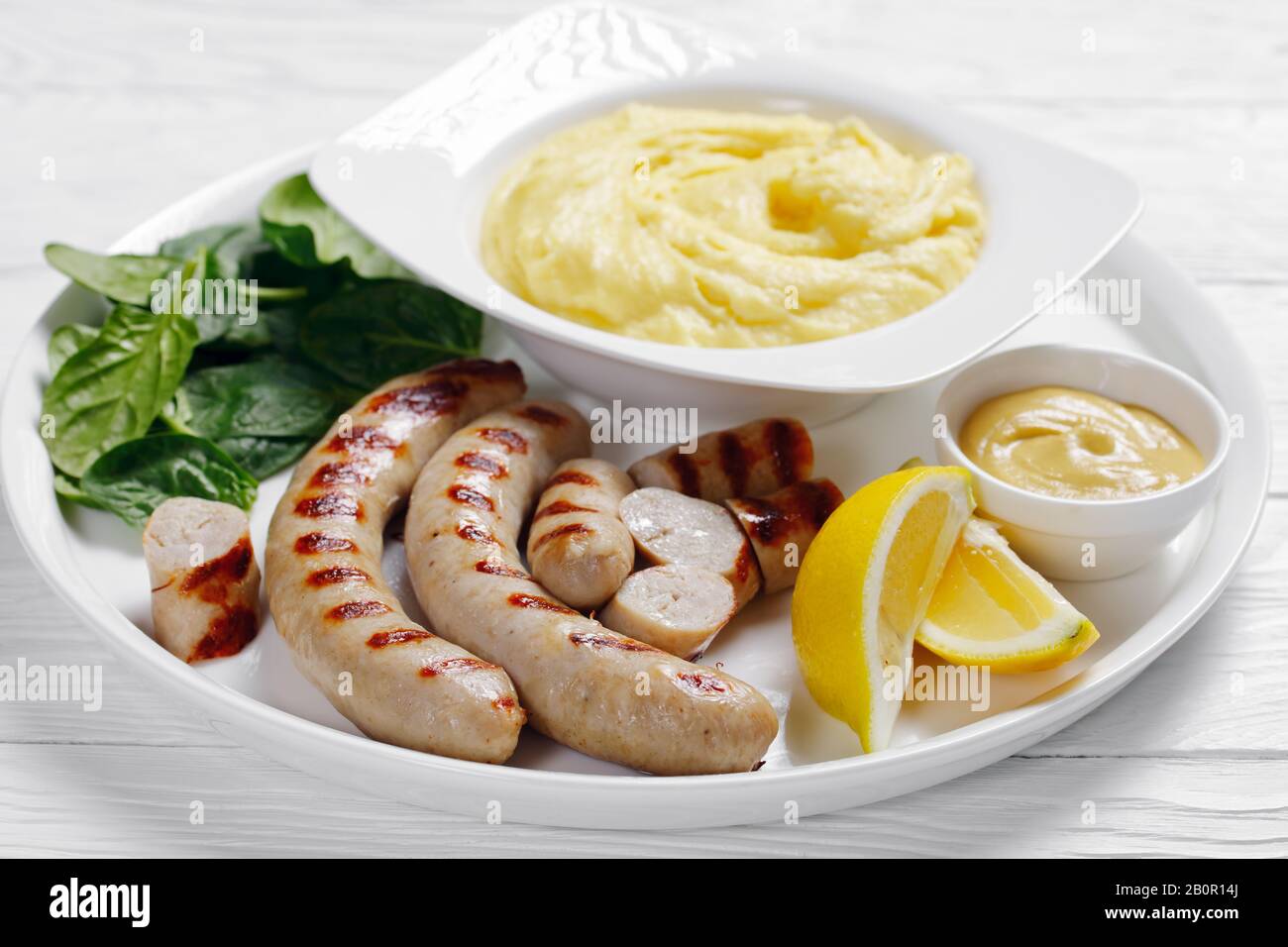 Classic french potato aligot whipped with melted cheese served with ...