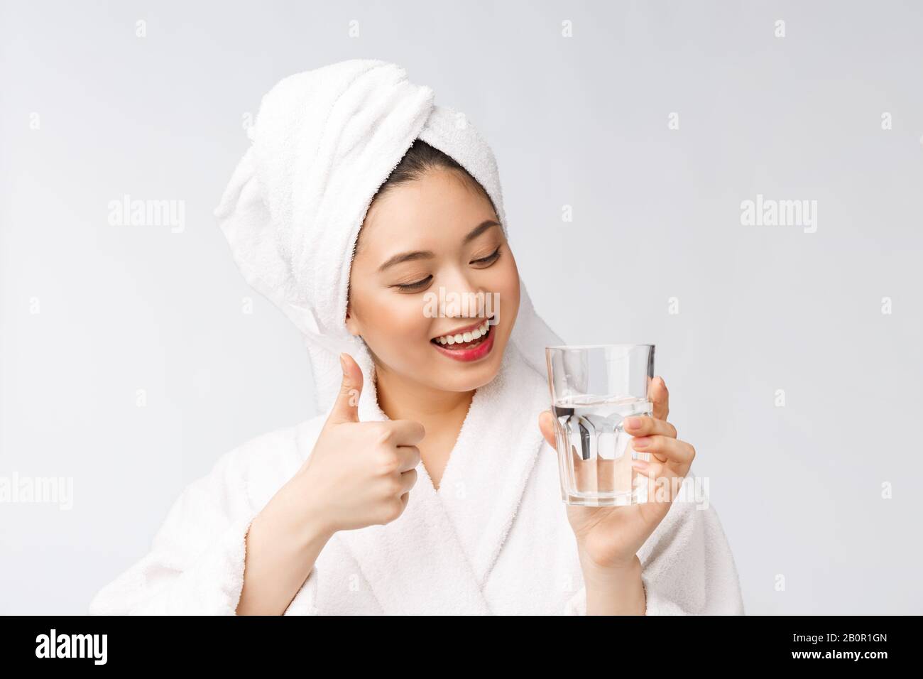 Healthy young beautiful woman drinking water, beauty face natural ...
