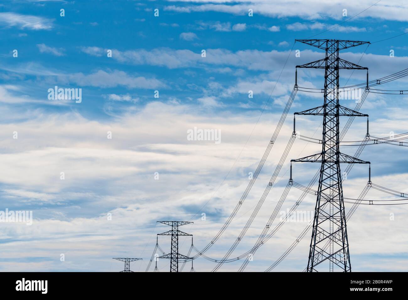 High voltage electric pole and transmission line. Electricity pylons ...