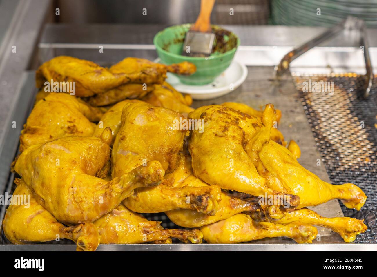 Delicious fried chicken quarters in restaurant kitchen counter Stock ...