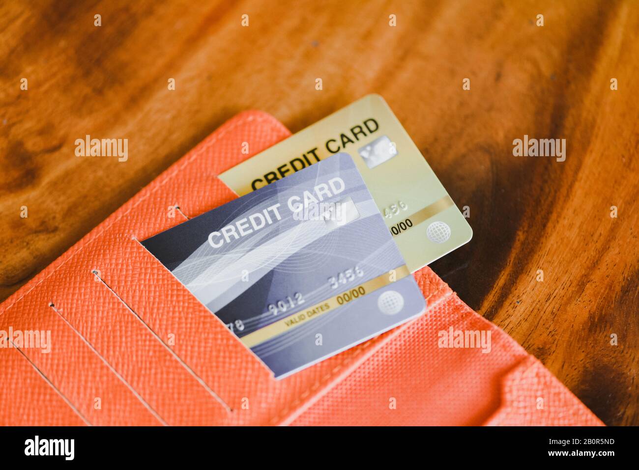 credit card in wallet on the wooden table background Stock Photo - Alamy