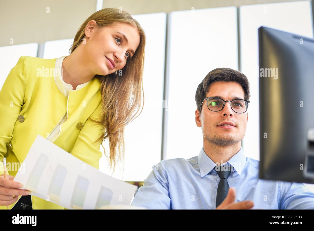Business people in meeting discussing about financial results in office ...